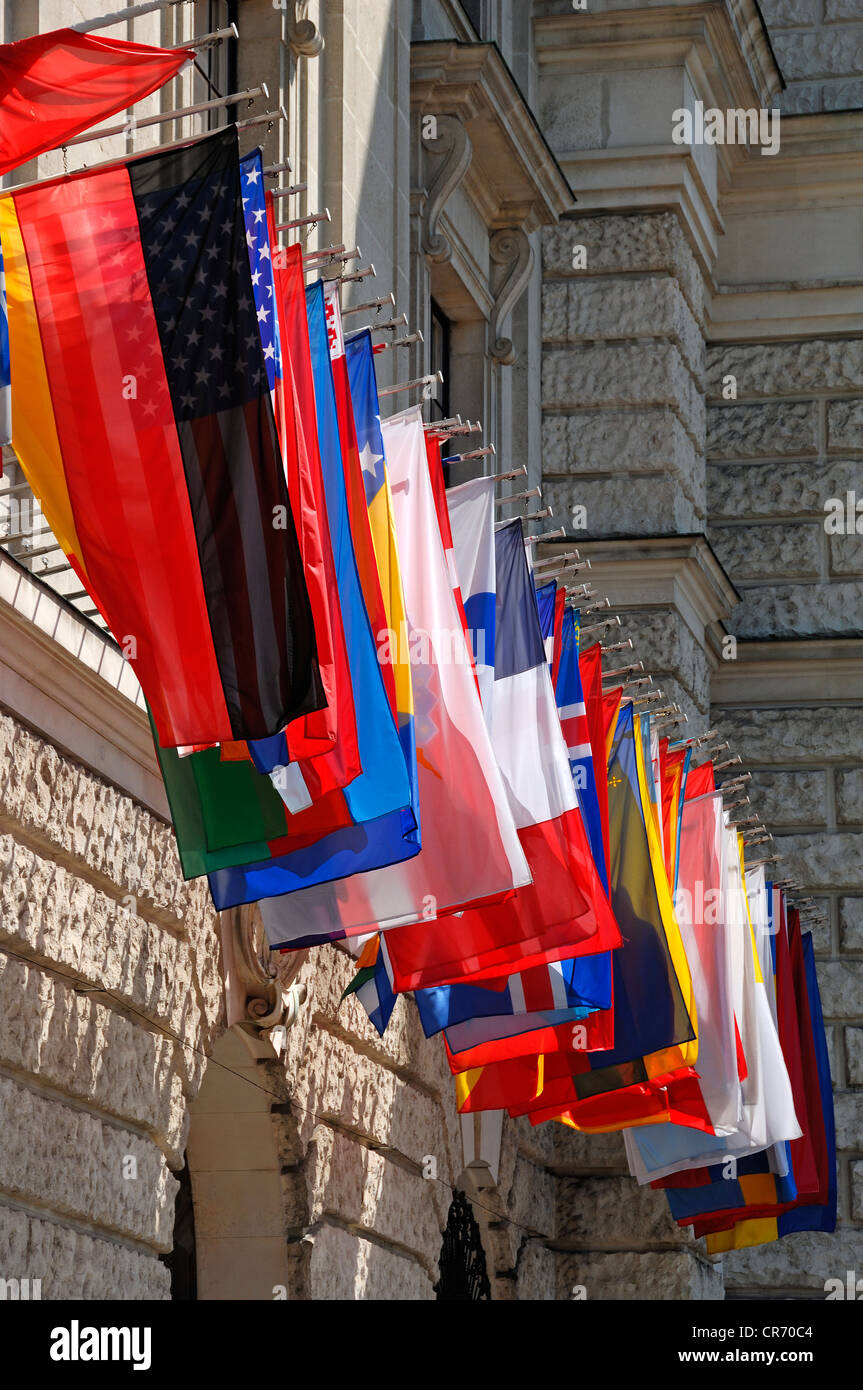 International flags at the Hofburg Imperial Palace, Heldenplatz square ...