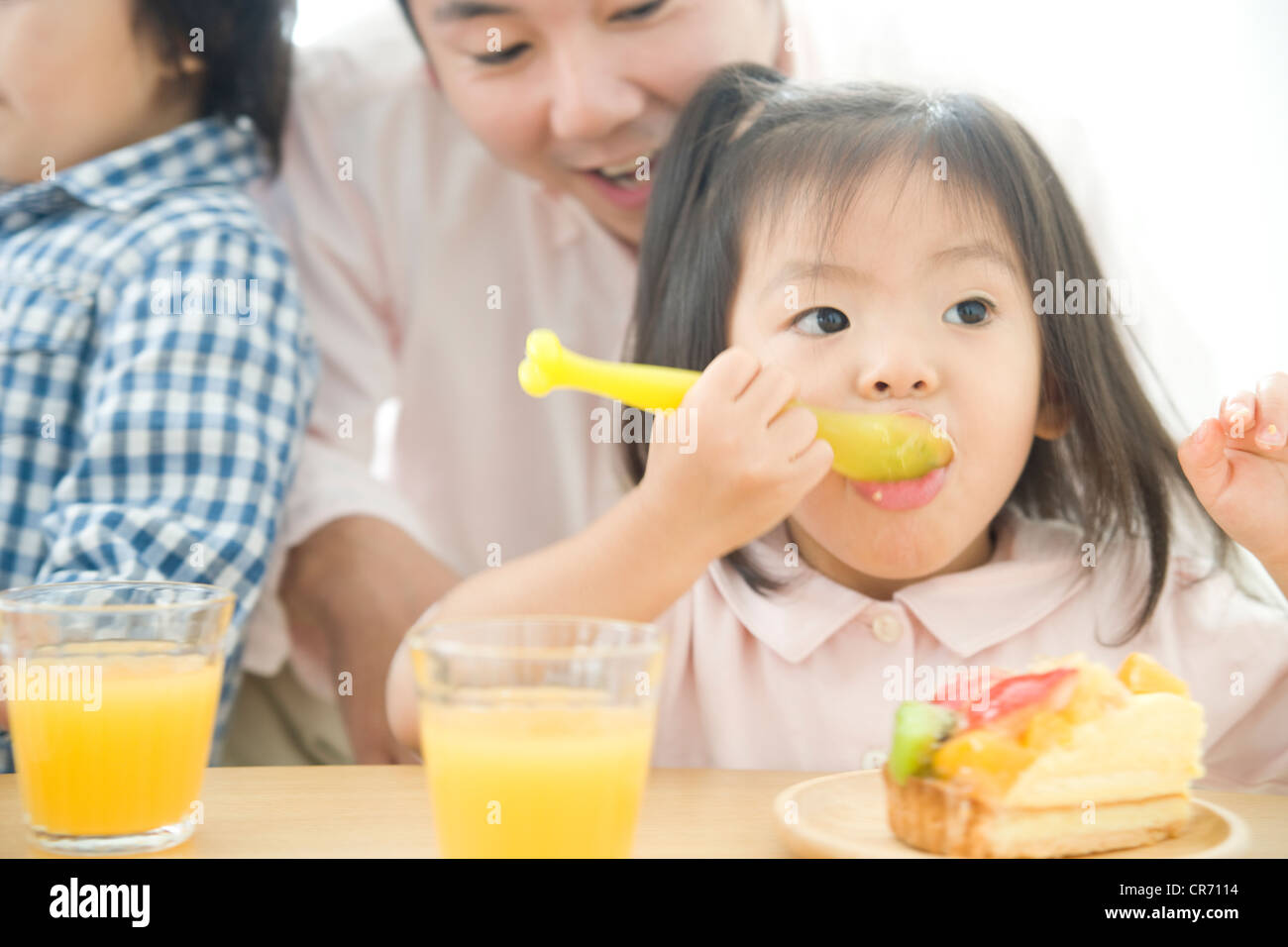 Boy sitting in front cake hi-res stock photography and images - Alamy