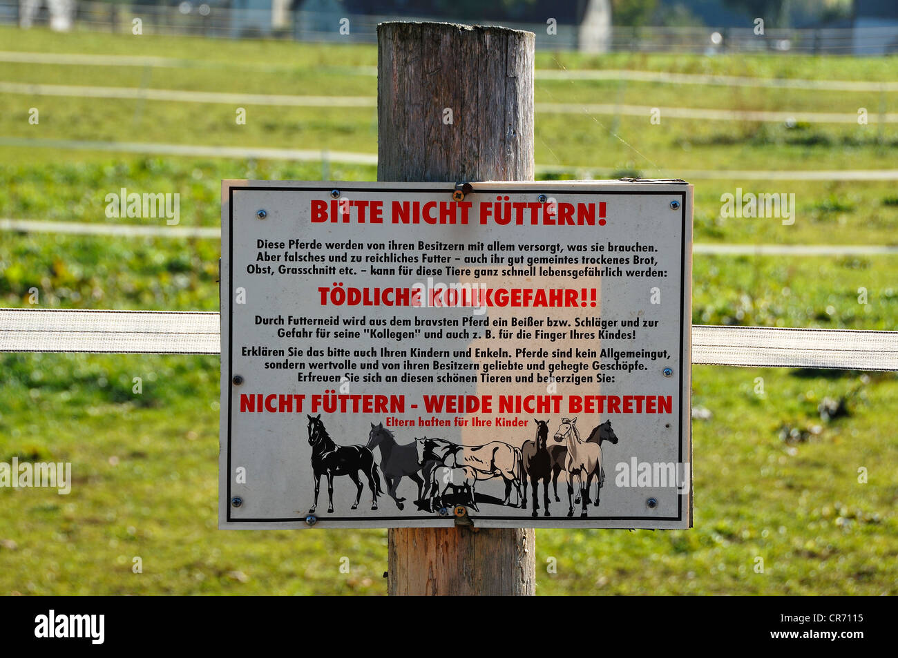 Prohibition sign "Bitte nicht fuettern", German for "Do not feed", on a ...