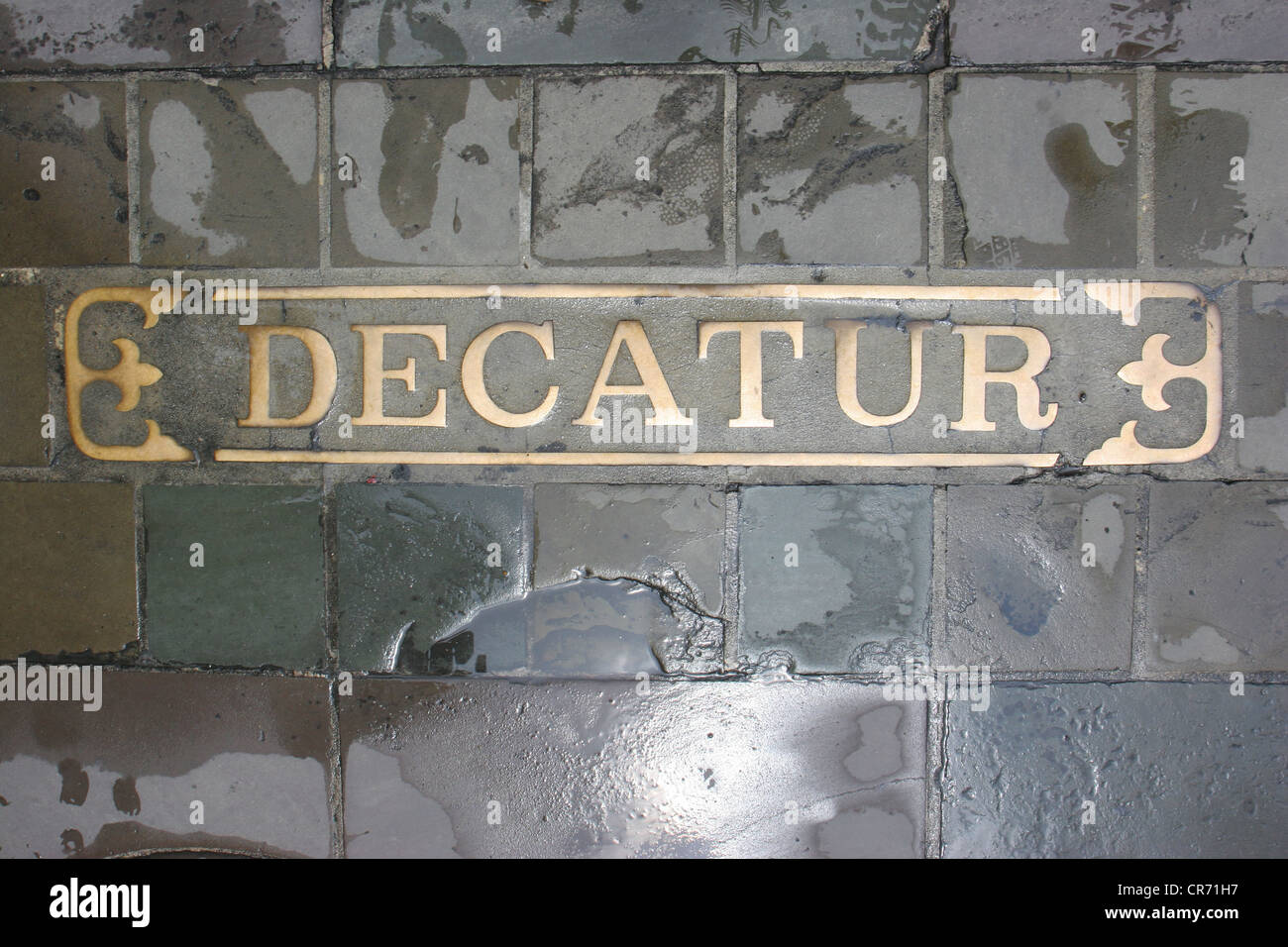 The street name on the pavement of Decatur Street, home of some of New ...