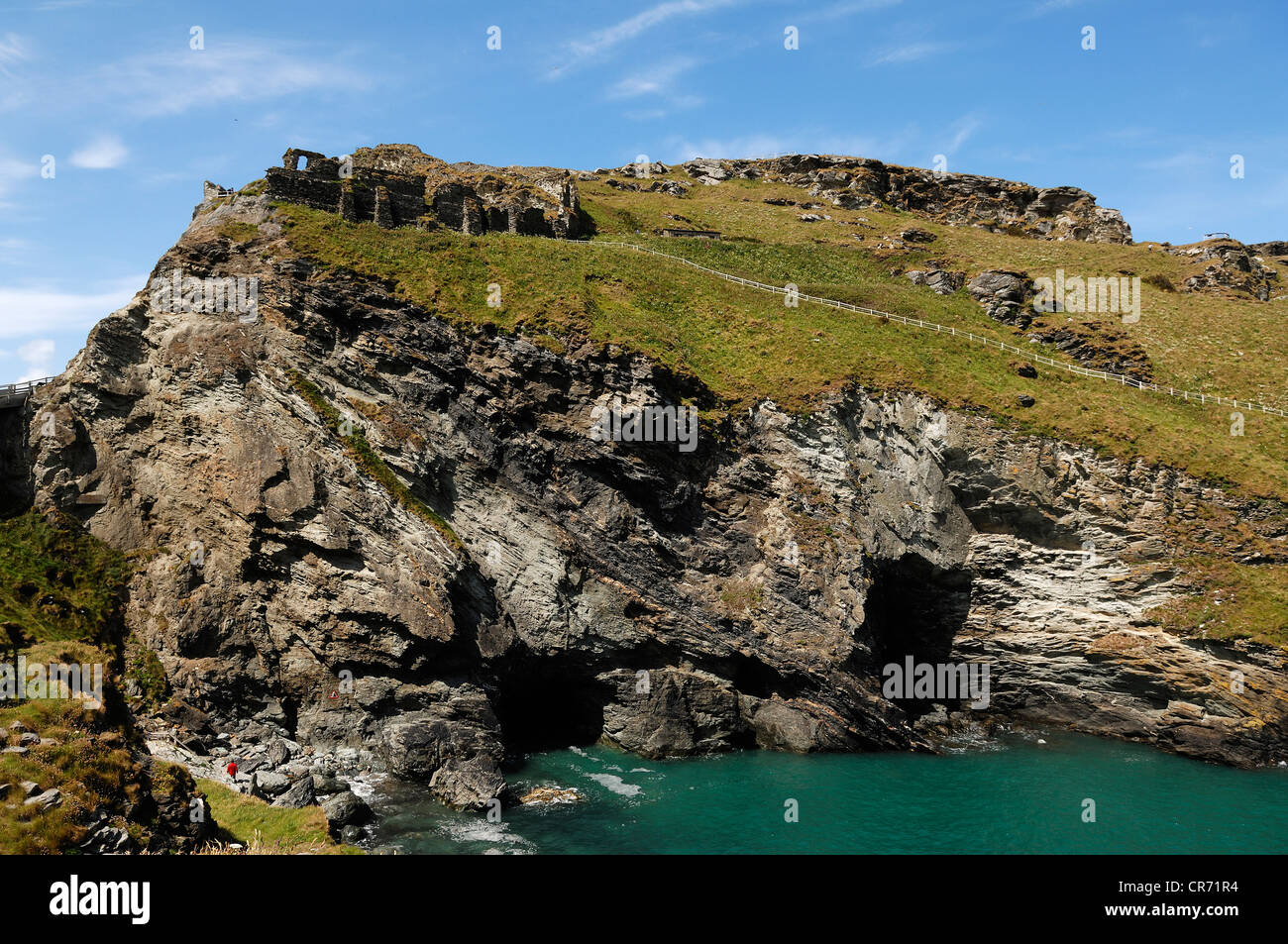 Rugged cliffs on the coast near Tintagel, Tintagel Castle on the cliff ...