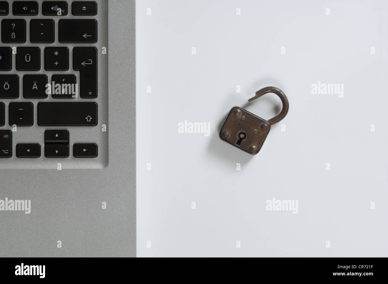 Laptop and padlock on white background Stock Photo - Alamy