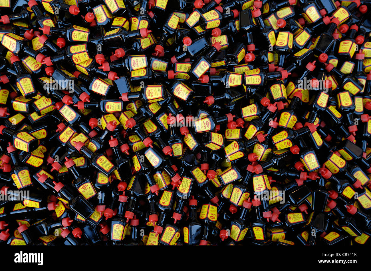 Many small Maggi spice bottles Stock Photo - Alamy