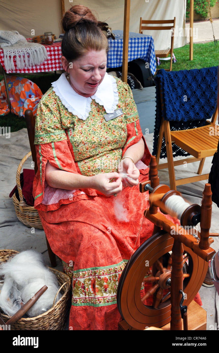 American Old West reenacting - spinning wool yarn demonstration Stock ...