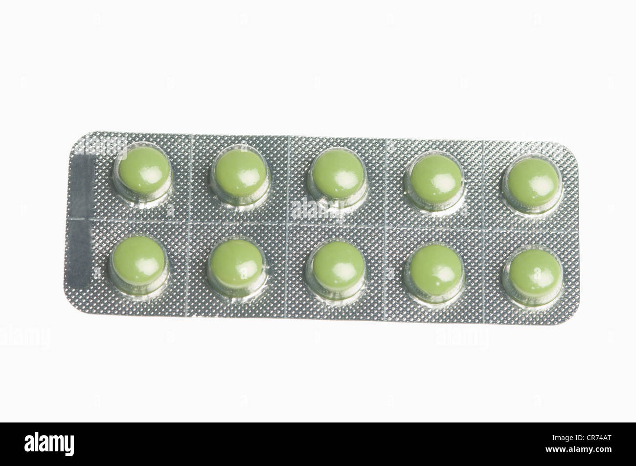 Green blister pack on white background Stock Photo - Alamy