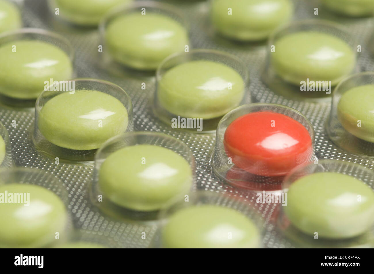 Green and red blister pack, close up Stock Photo - Alamy