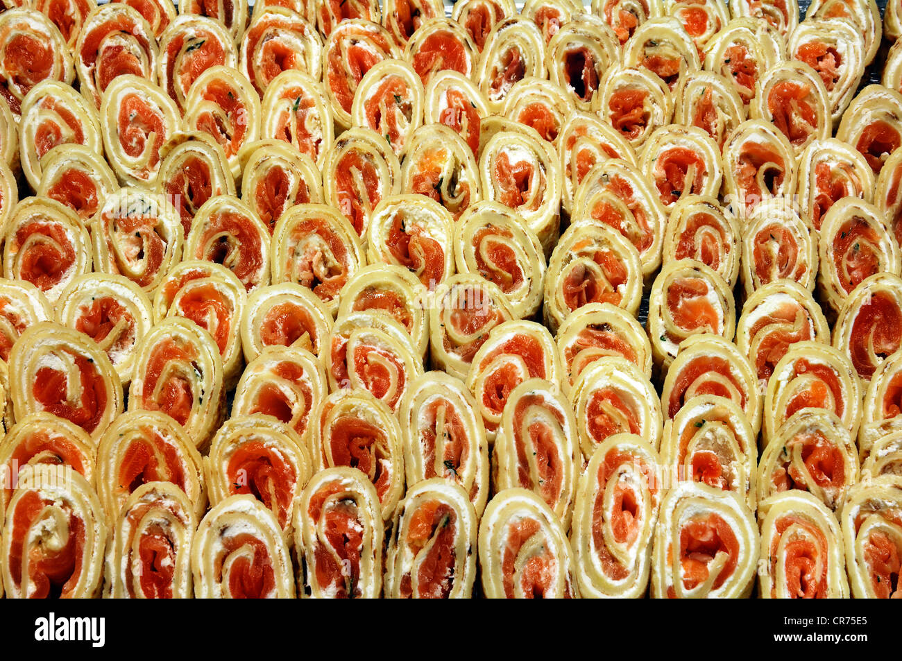 Crepes stuffed with salmon, finger food Stock Photo - Alamy
