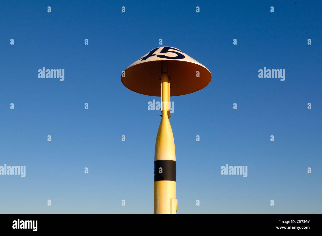 Marking pole of a gas pipeline against a blue sky, Neso, Mecklenburg ...