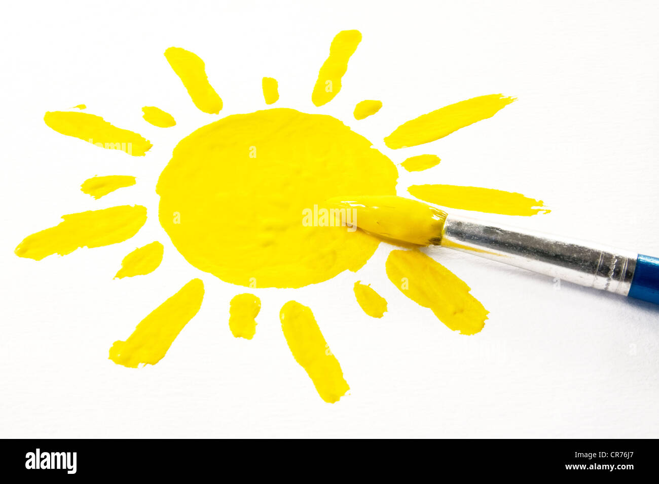 paintbrush and painted sun on white background Stock Photo - Alamy