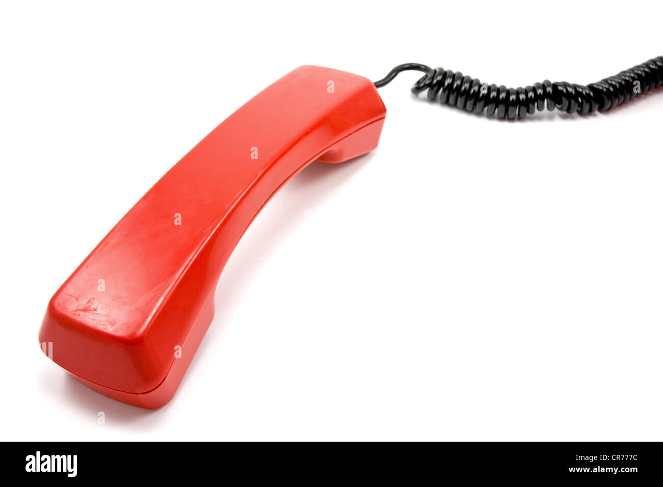 red old scratched telephone receiver on white background Stock Photo ...