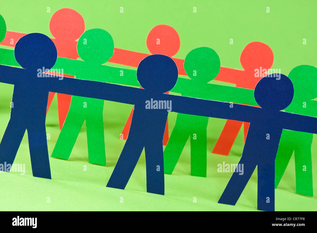 paper people doing teamwork in their business Stock Photo - Alamy