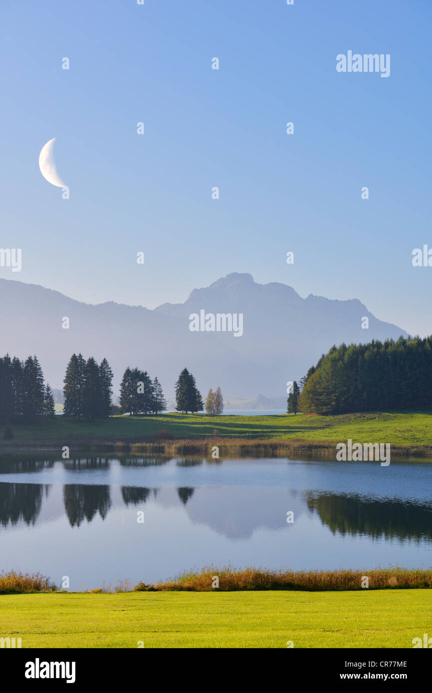 Forggensee Lake near Fuessen, Tannheimer Berge mountain range, moon ...