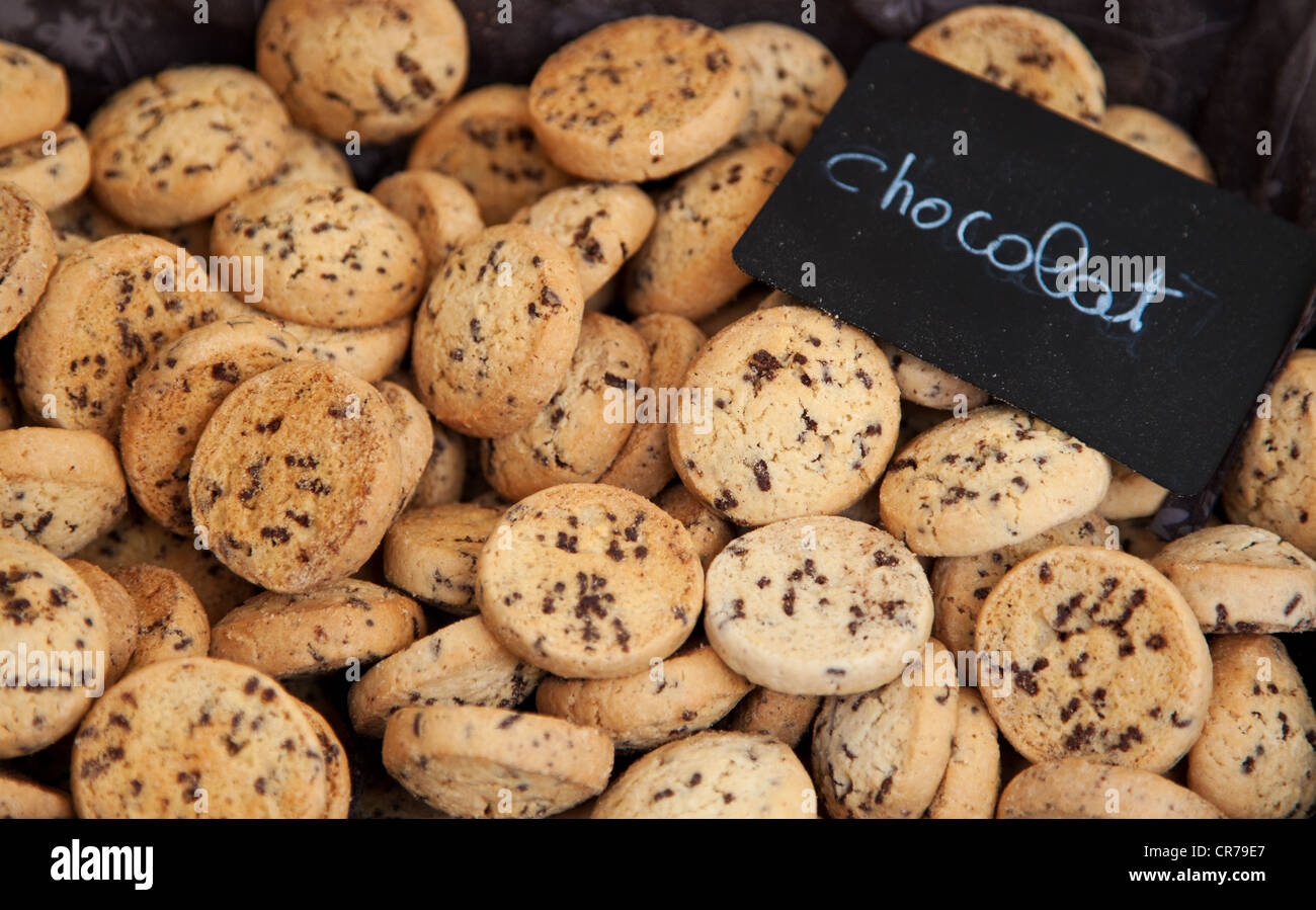 Chocolate cookies offered at market stall Stock Photo - Alamy