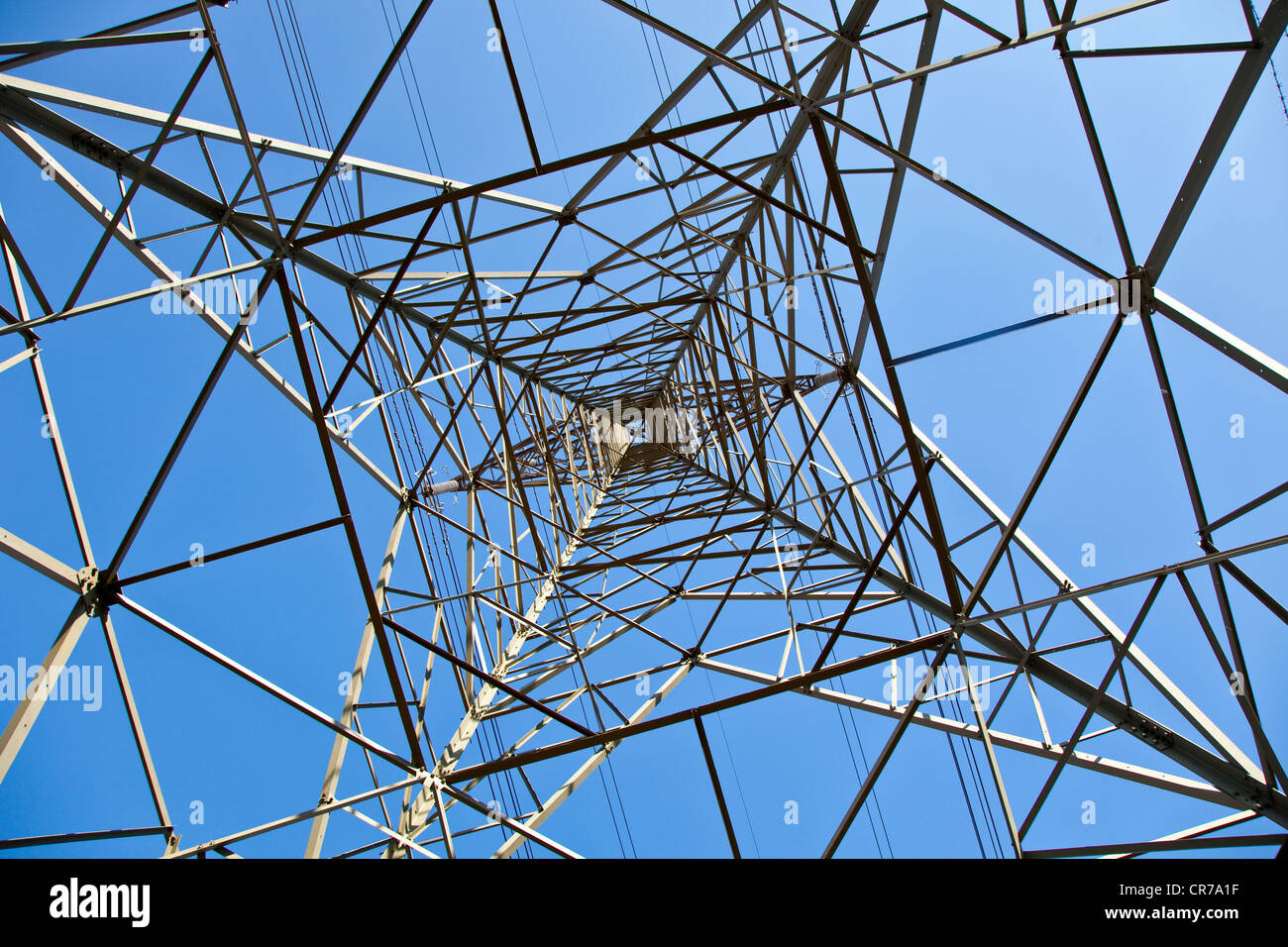 Pylon tower structure viewed from directly below against blue sky Stock ...