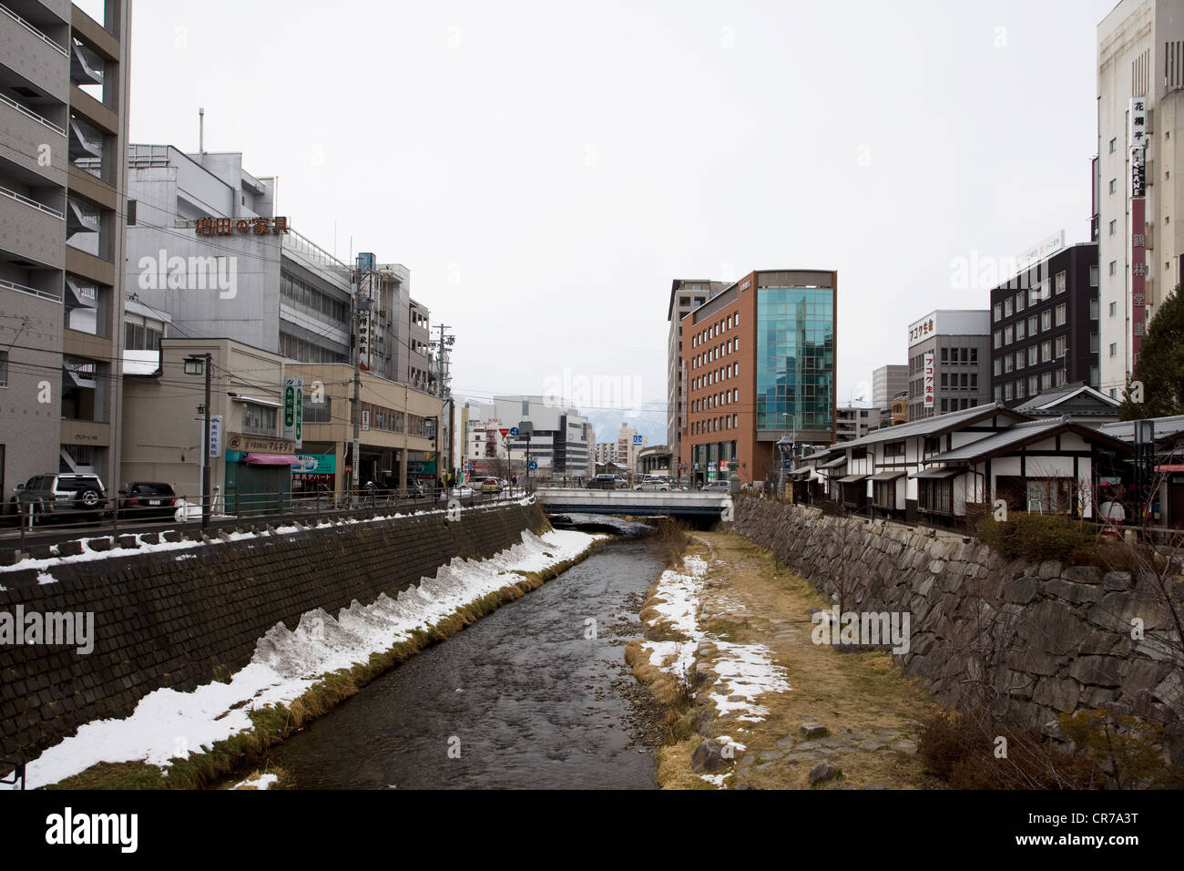 Cityscape with stream Stock Photo - Alamy