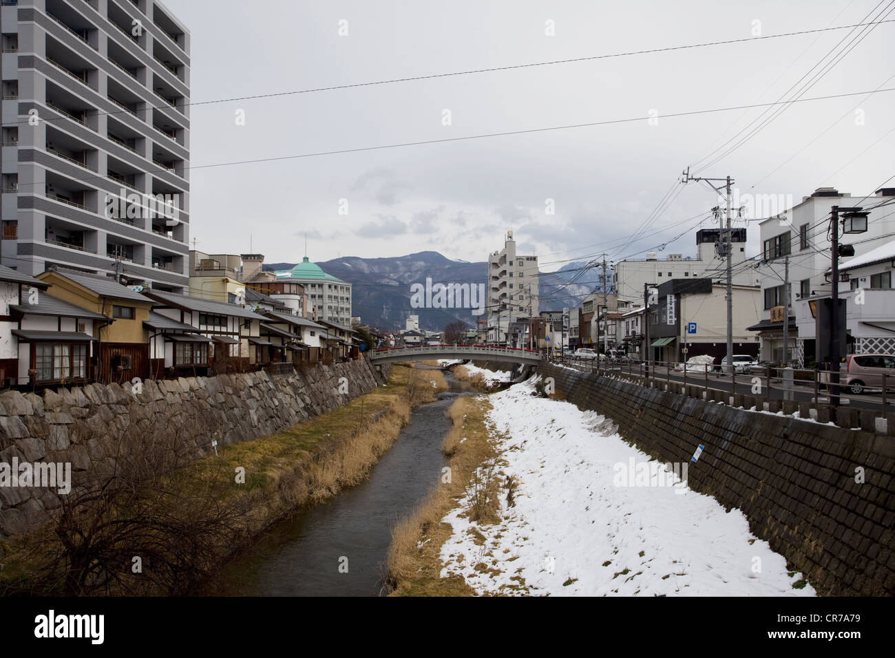 Cityscape with stream Stock Photo - Alamy