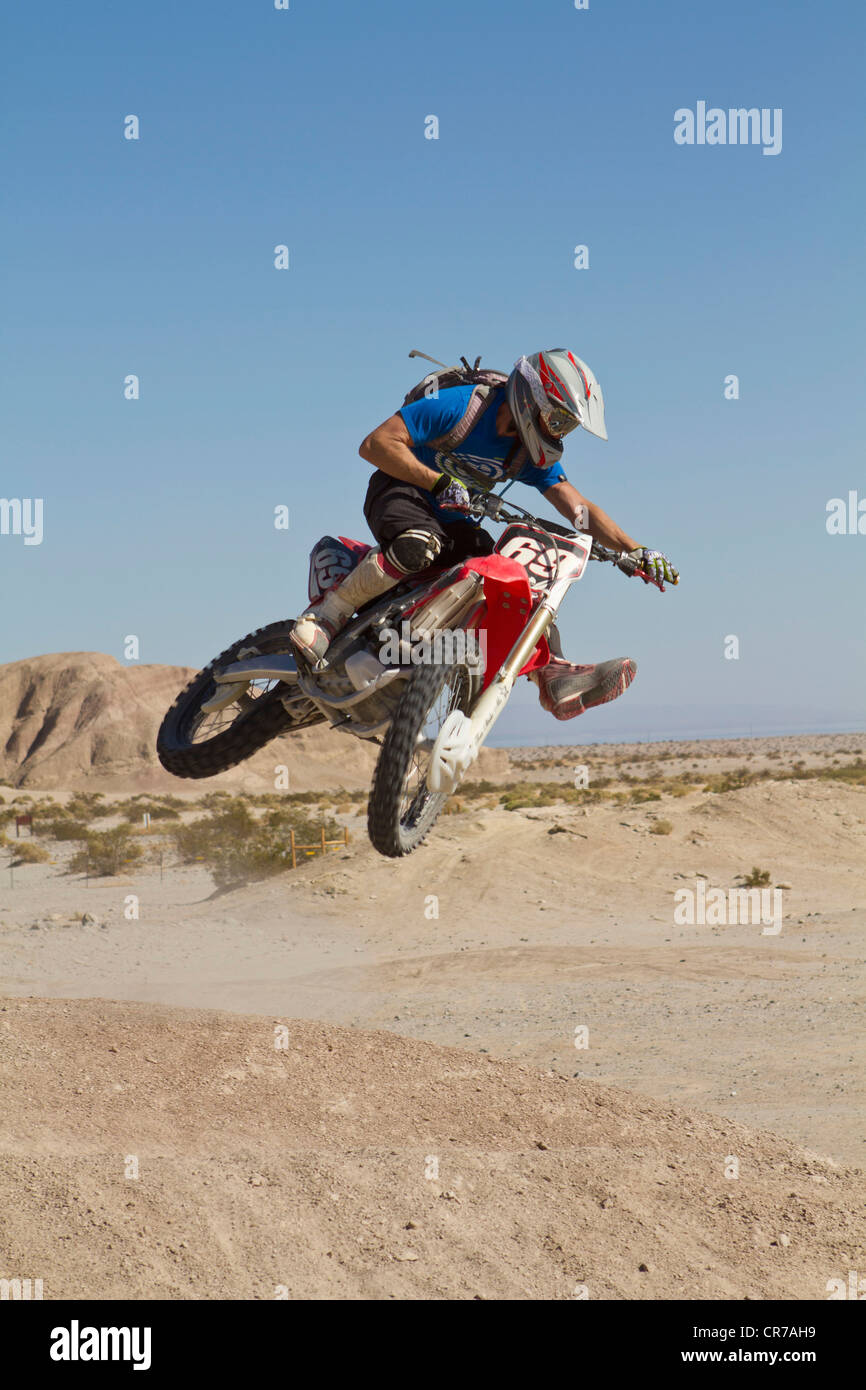 Motocrosser jumping on palm desert hi-res stock photography and images ...