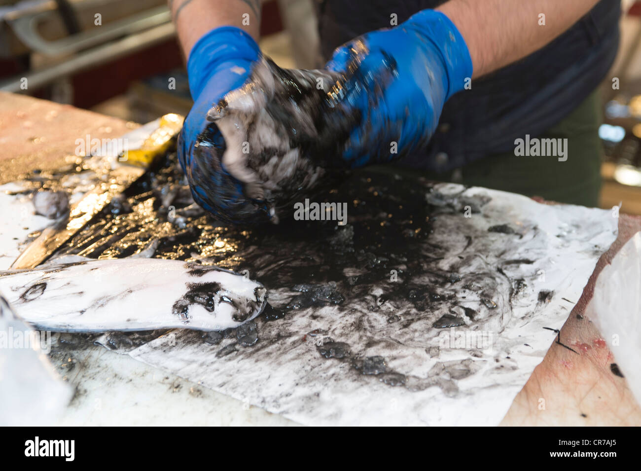 Fish cleaning cuttle fish fish hi-res stock photography and images - Alamy