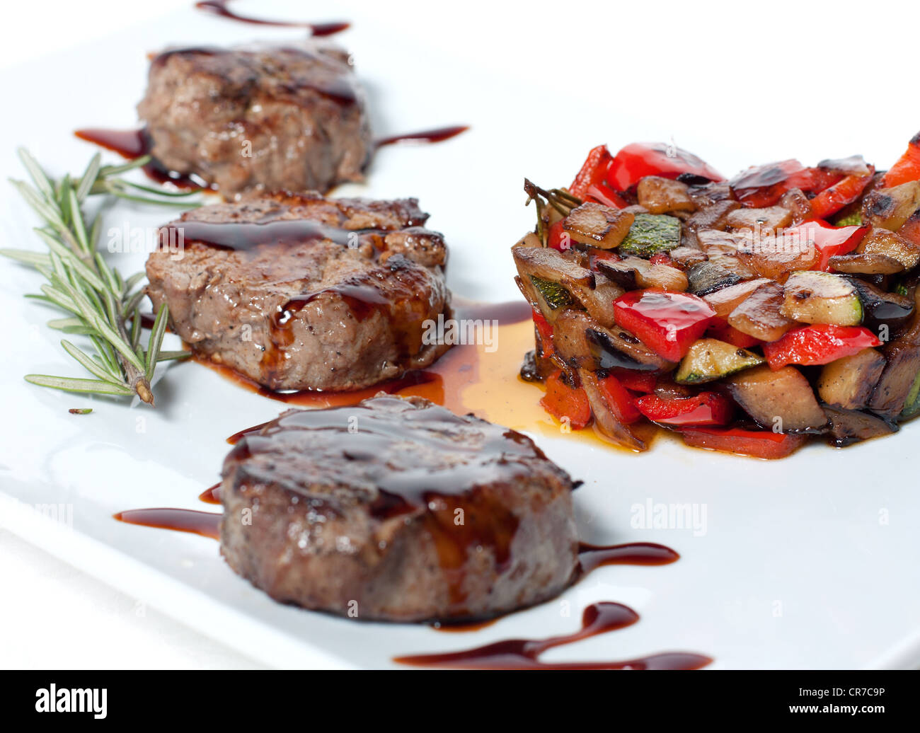 Roasted vegetables and meat with chocolate sauce Stock Photo - Alamy