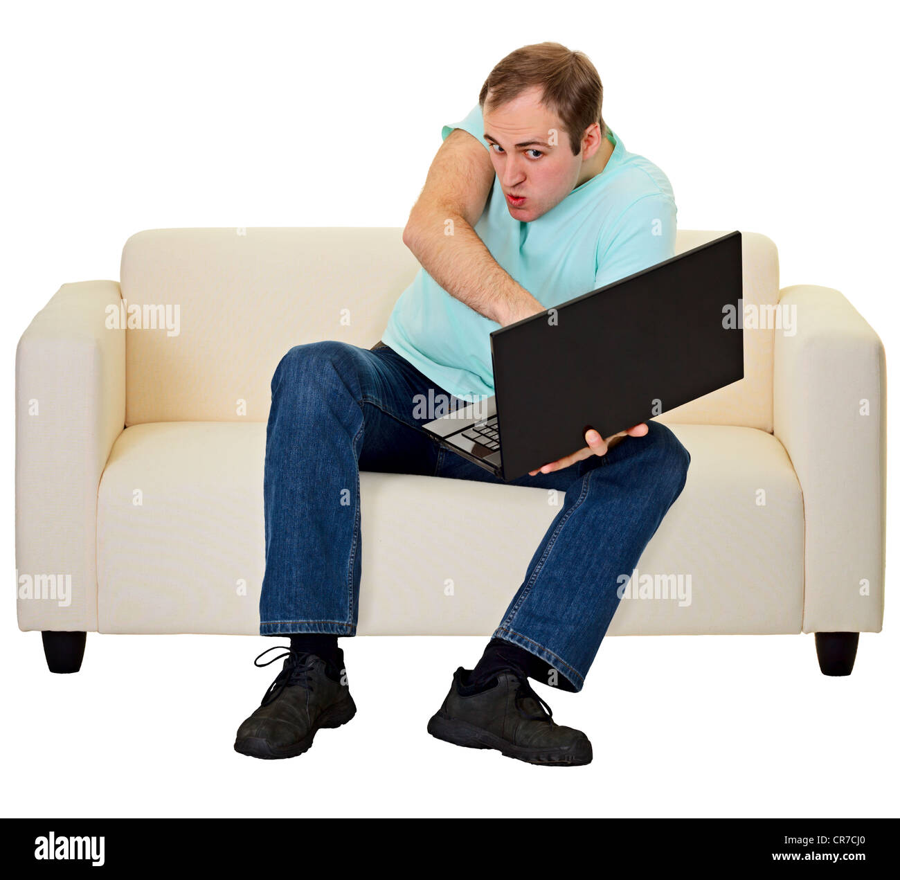 Funny guy plays with a laptop isolated on white background Stock Photo ...