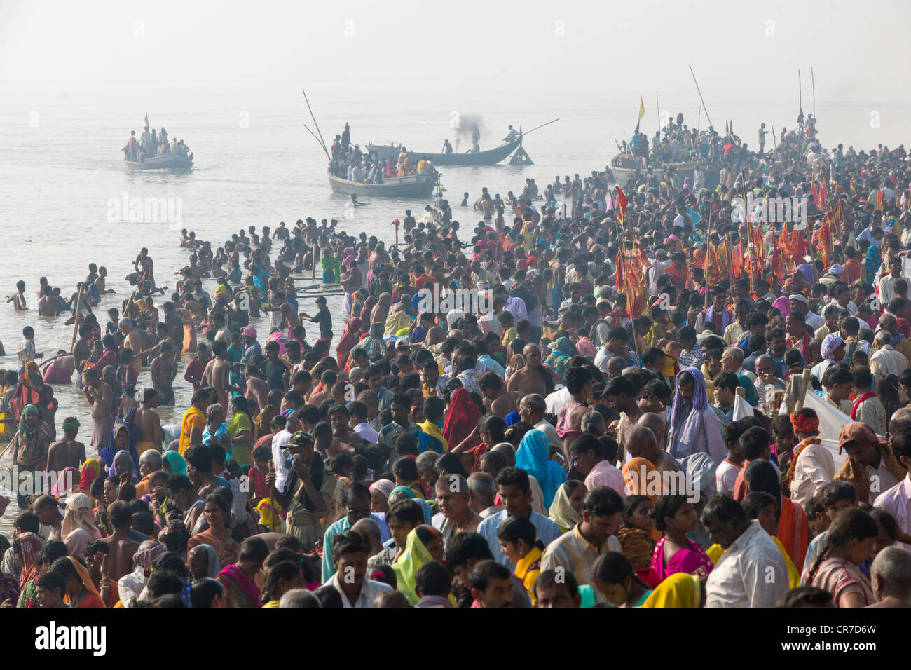 Pilgrims bathing at the confluence of the Rivers Ganges and Gandak ...