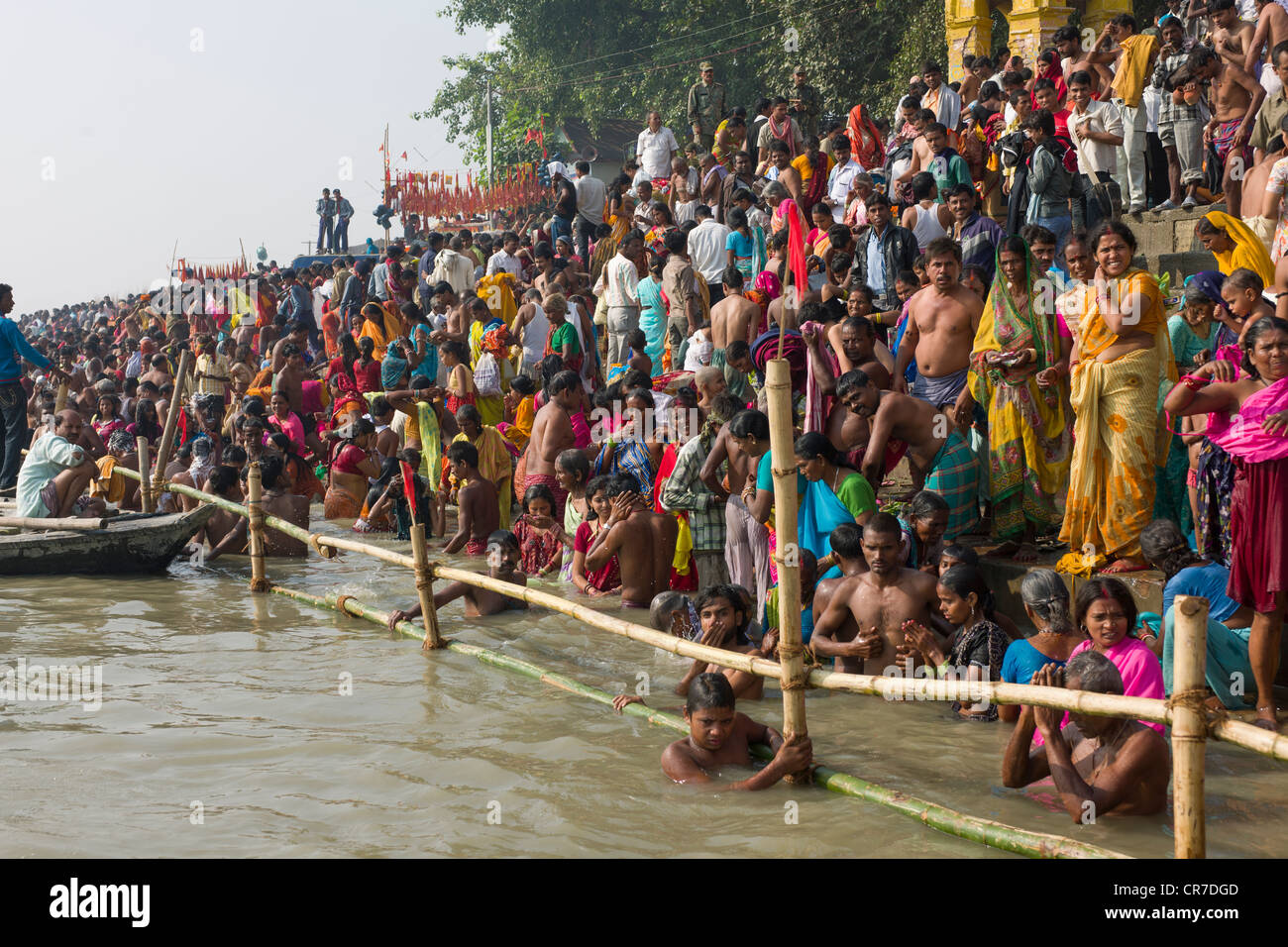 Pilgrims bathing at the confluence of the Rivers Ganges and Gandak ...