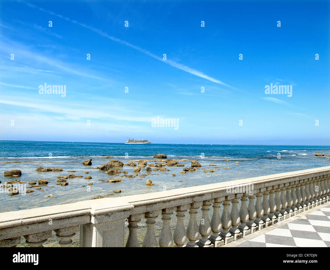 Seafront boulevard with cruise ship in distance Stock Photo - Alamy