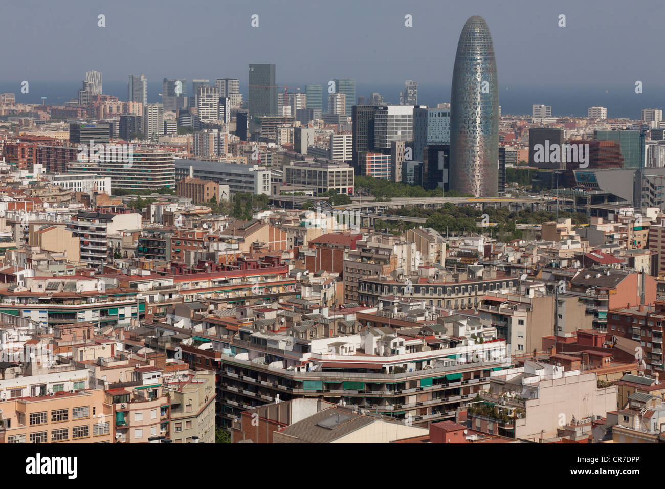Aerial view from the towers of Sagrada Familia over Barcelona with the ...