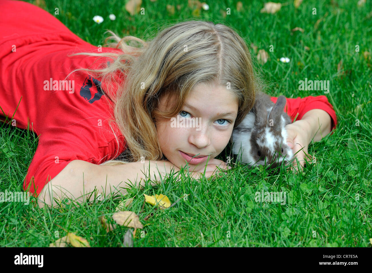 Girl laying bunny hi-res stock photography and images - Alamy