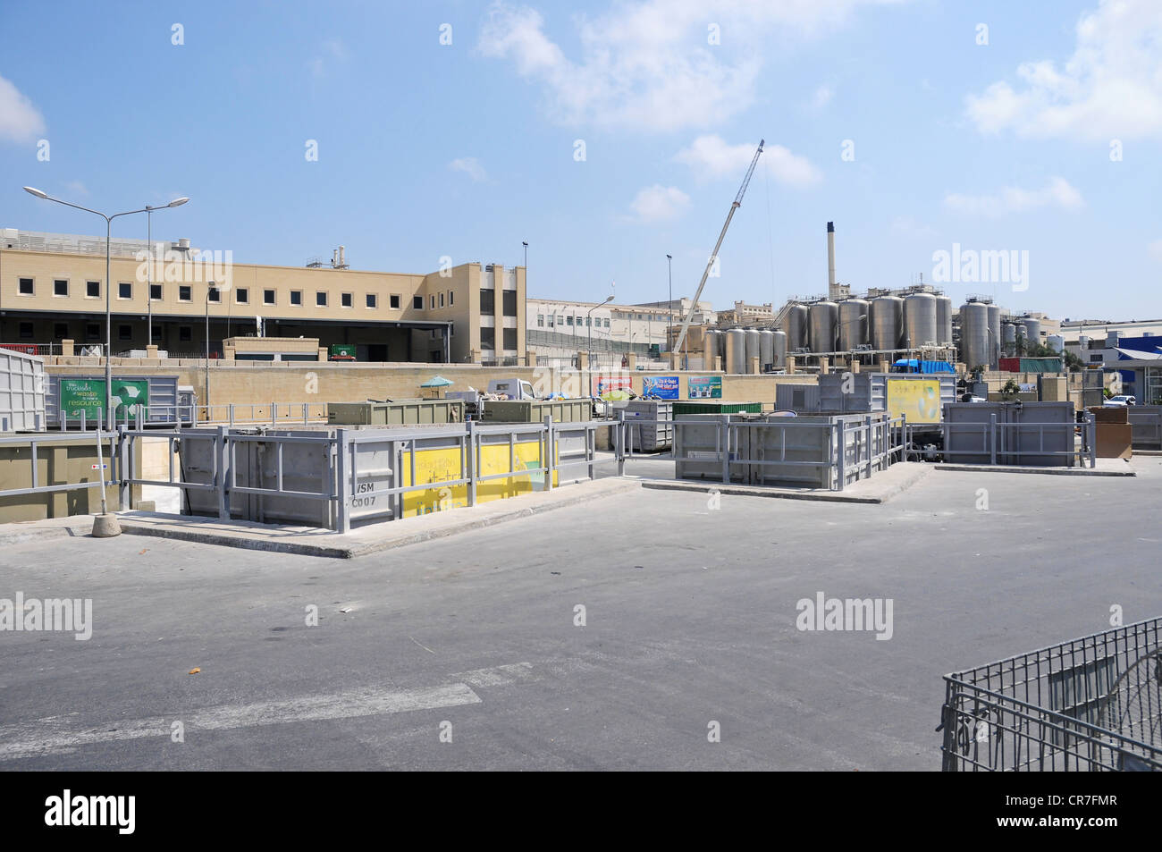 A civic amenity site where different recyclable materials are separated ...