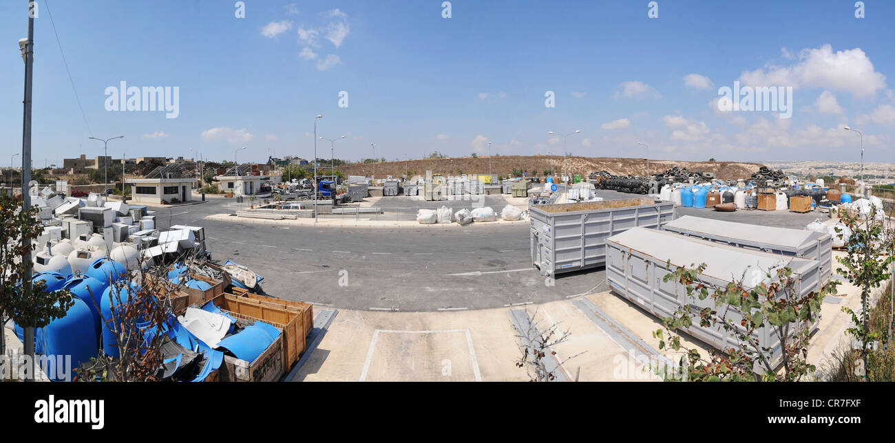 A civic amenity site where different recyclable materials are separated ...