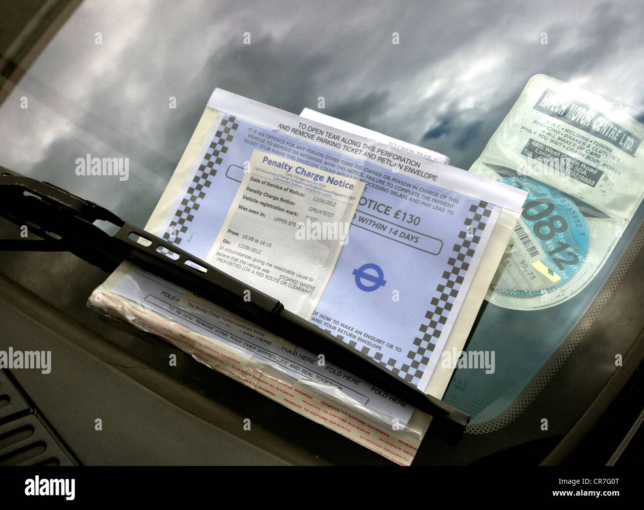 Penalty Charge notice on car left on Red Route, London Stock Photo - Alamy
