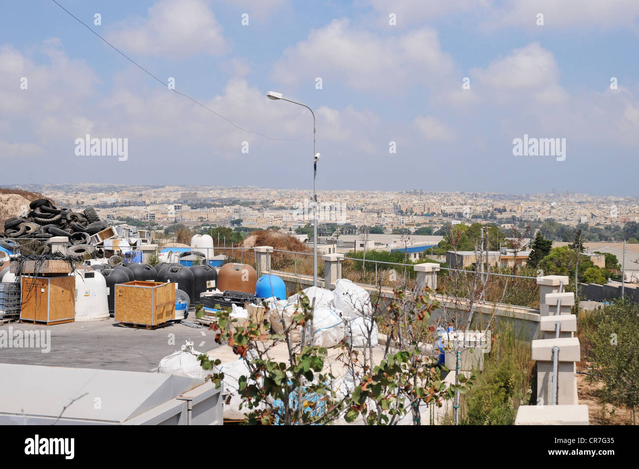A civic amenity site where different recyclable materials are separated ...