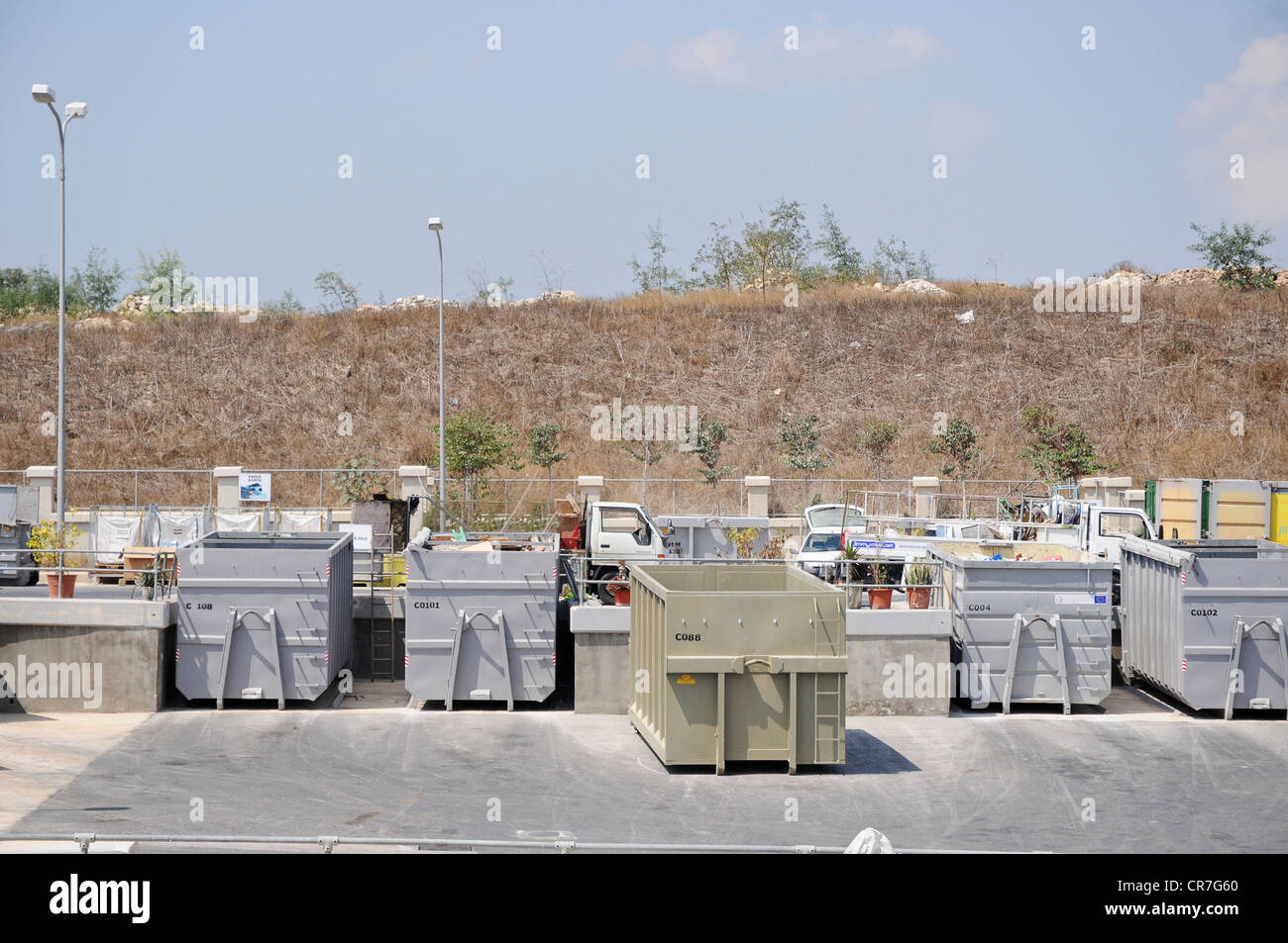 A civic amenity site where different recyclable materials are separated ...