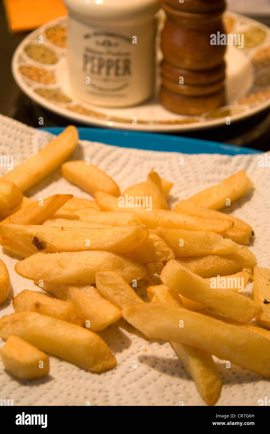 Fatty unhealthy snack of Chips on Plate Stock Photo - Alamy