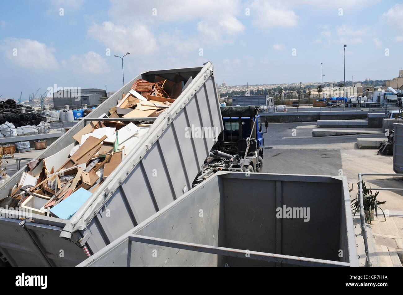 A civic amenity site where different recyclable materials are separated ...