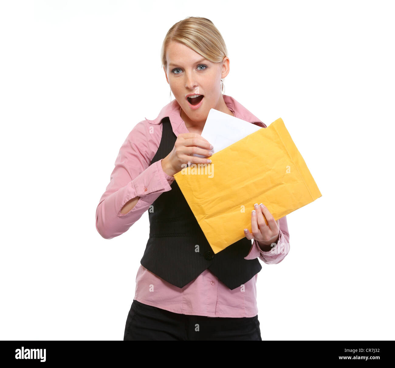Surprised woman opening letter Stock Photo - Alamy