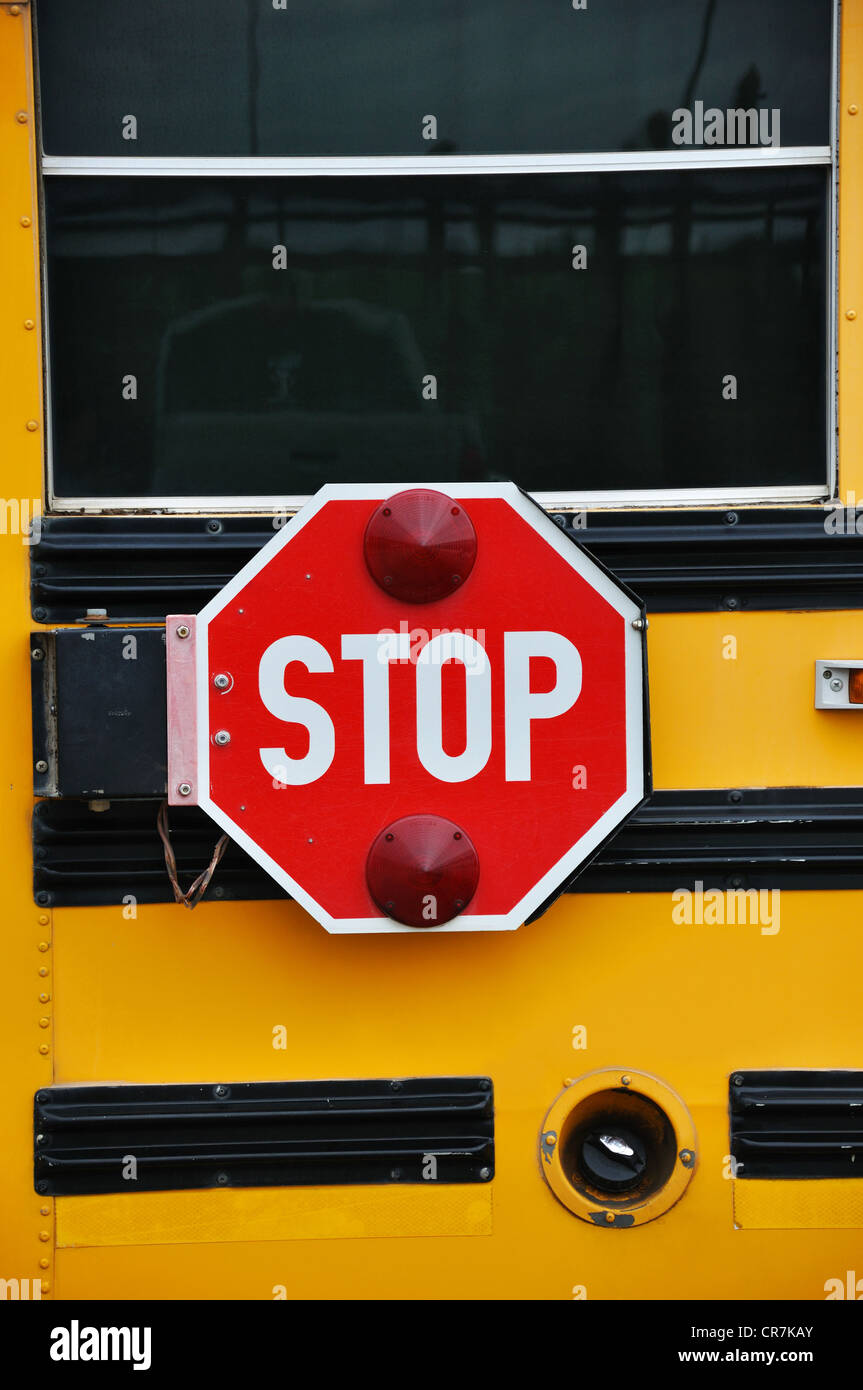 Stop sign on school bus Stock Photo - Alamy