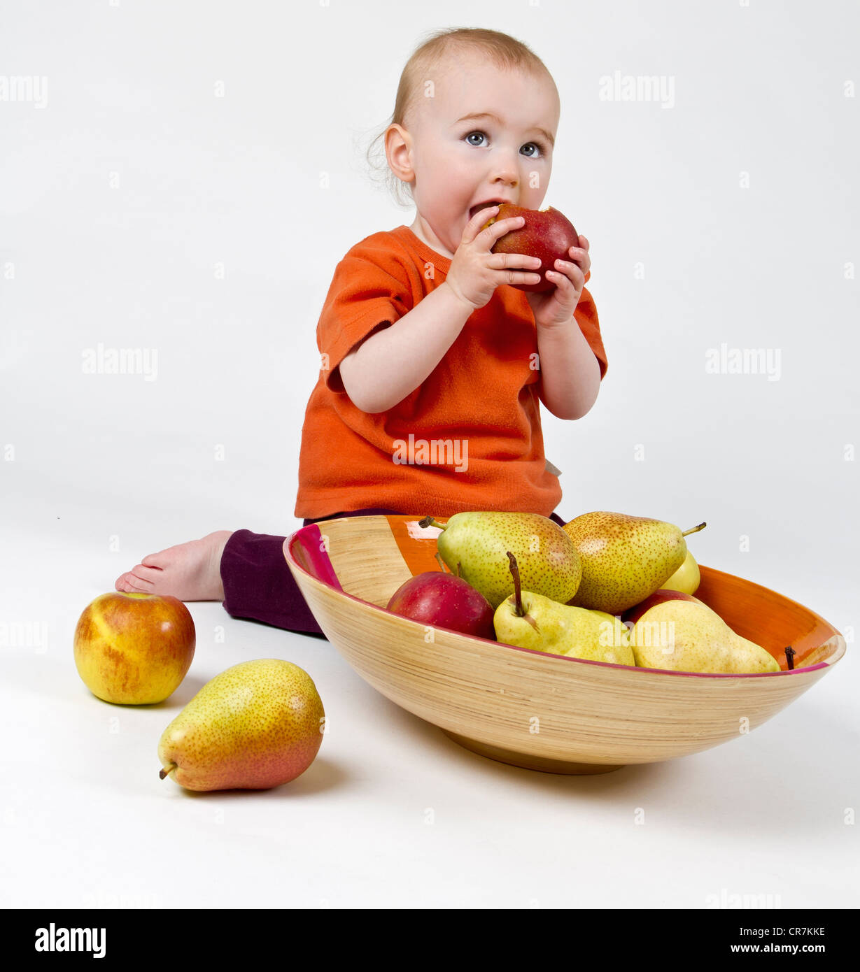 Baby eating pears and apples hi-res stock photography and images - Alamy