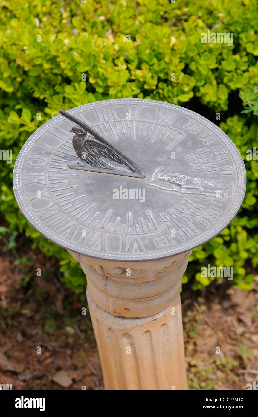 Sun clock in garden Stock Photo - Alamy