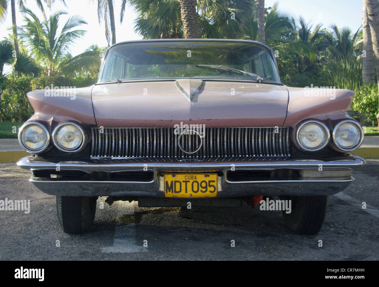 Old car parked outside a hotel Stock Photo - Alamy