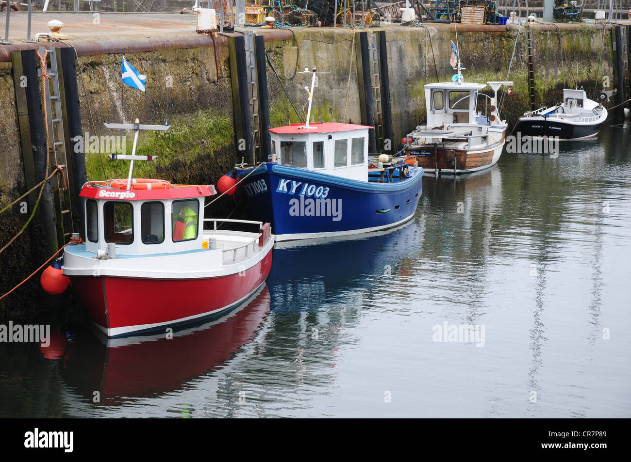 Fishing boats in the harbour of the Fife fishing port of St Monans ...