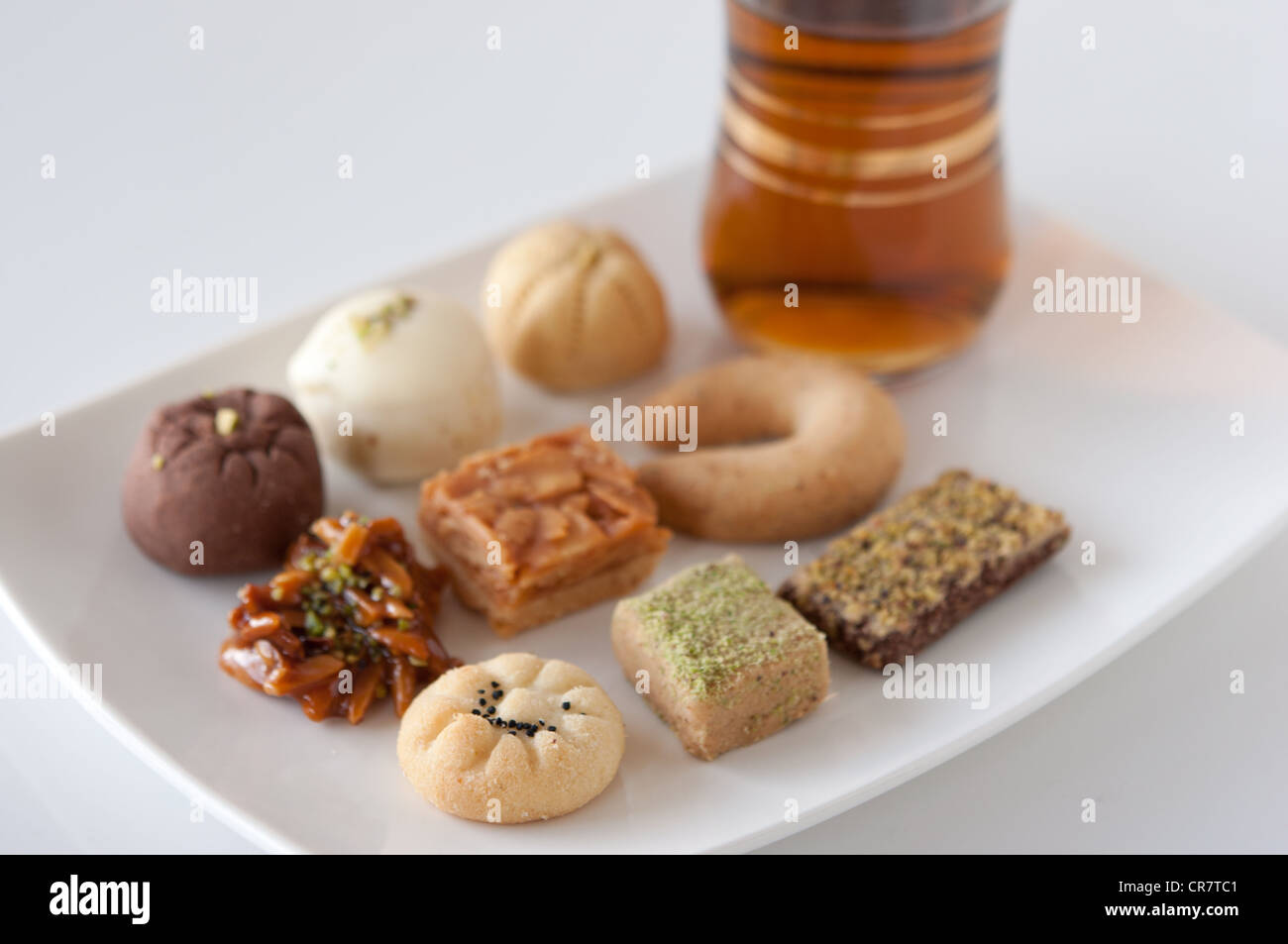 Traditional Persian shirini cookies with tea Stock Photo - Alamy