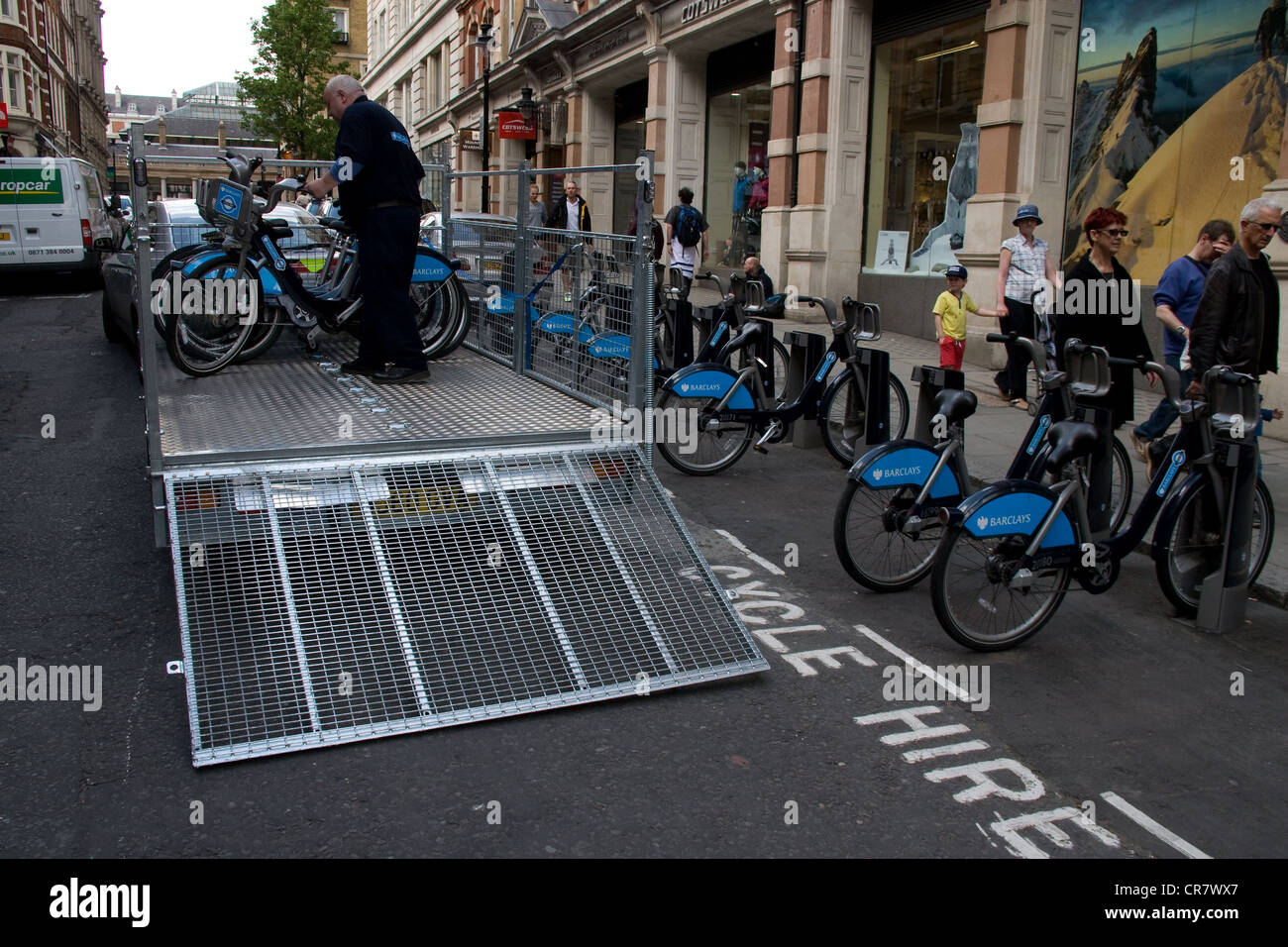 transport of TFL bikes loading unloading Stock Photo - Alamy