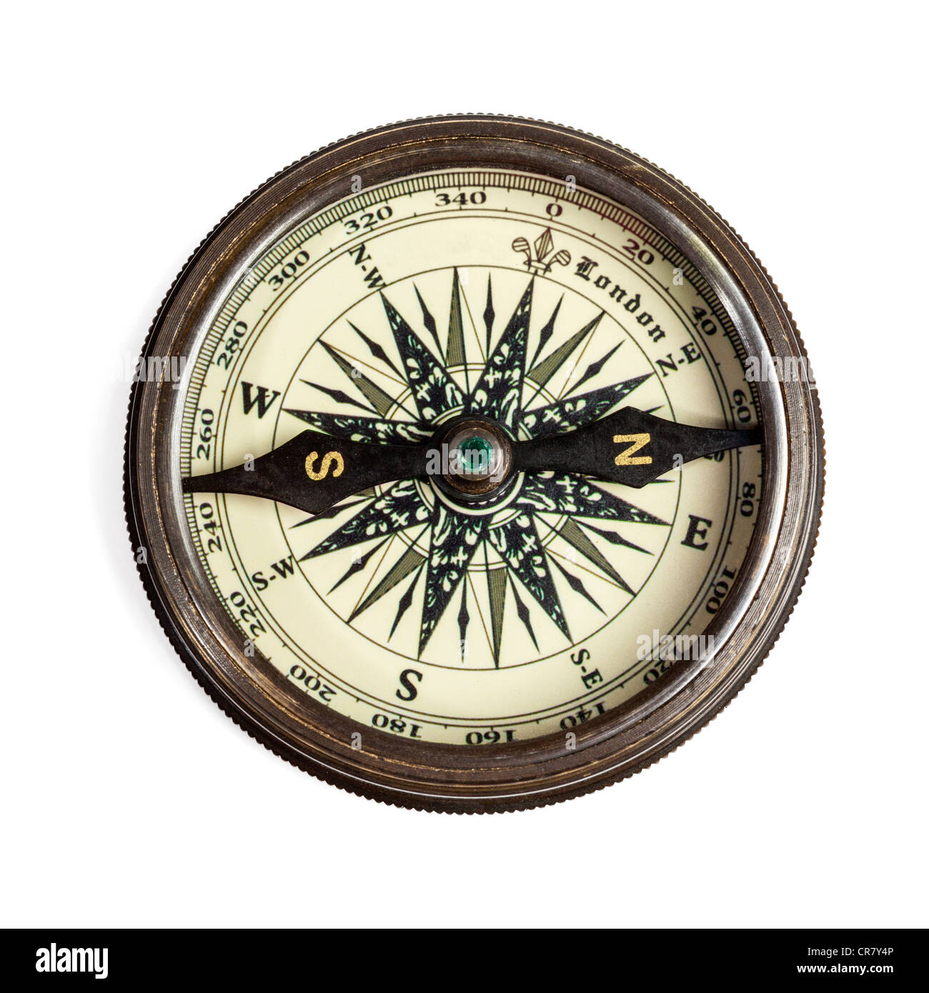 Old vintage retro brass compass isolated Stock Photo - Alamy