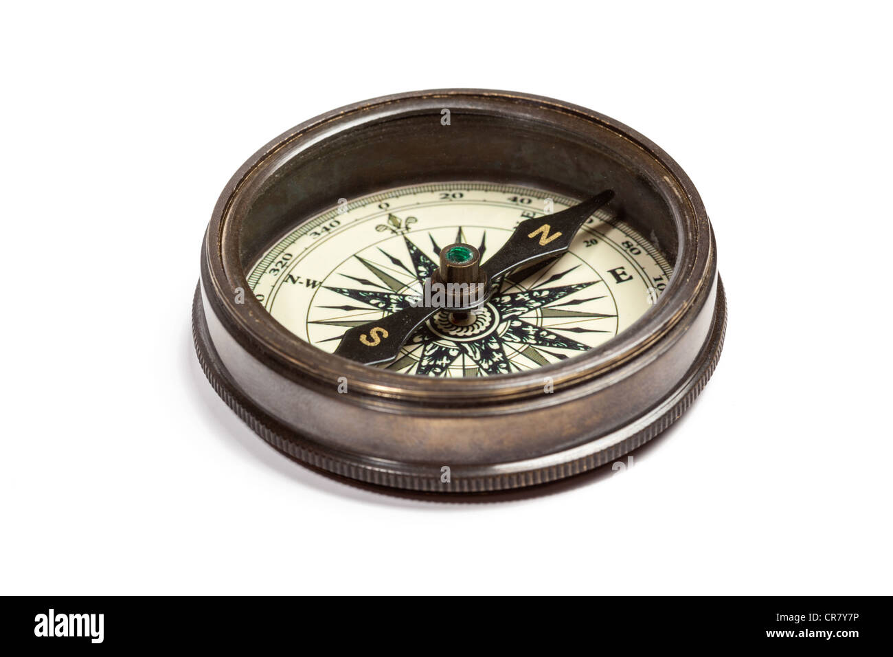 Old vintage retro brass compass isolated Stock Photo - Alamy