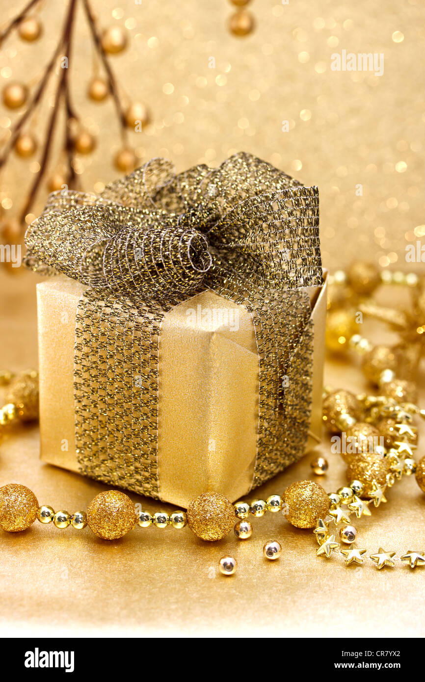 Golden Christmas Gift Stock Photo - Alamy