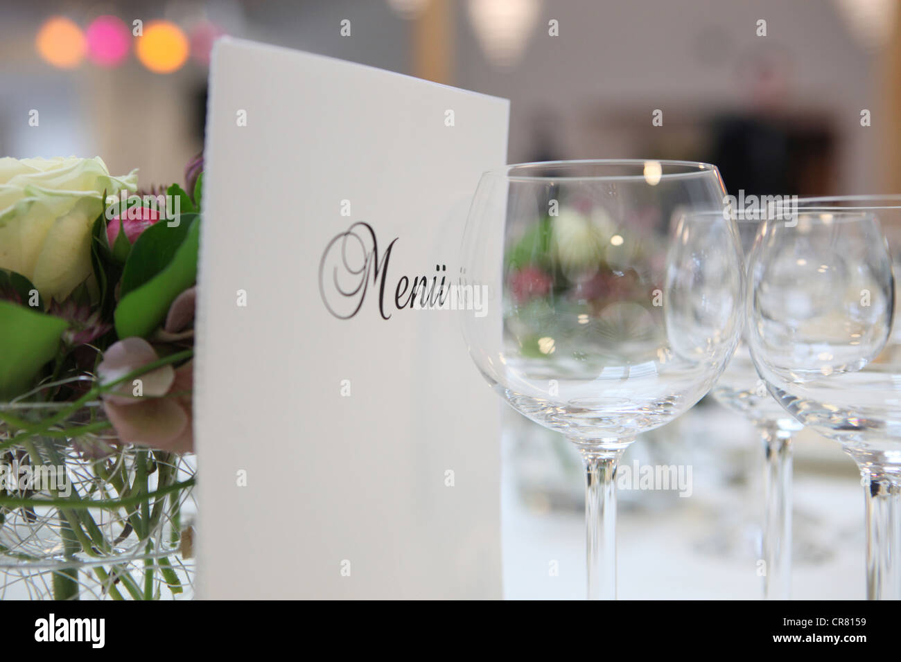 Banquet, dinner table, table decorated for a celebration with a menu ...
