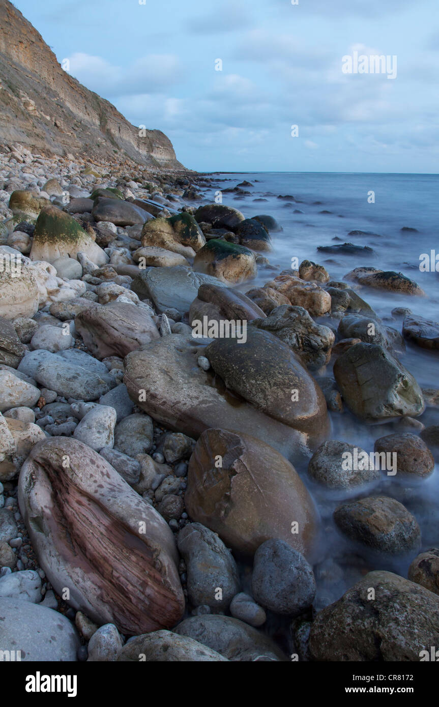 This rugged, rocky, boulder strewn beach, east of Osmington Mills in ...