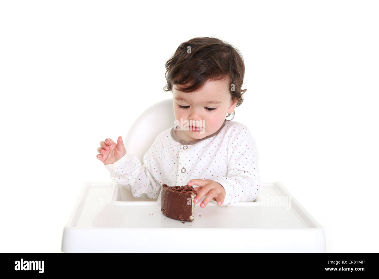 Baby eating chocolate cake Stock Photo - Alamy